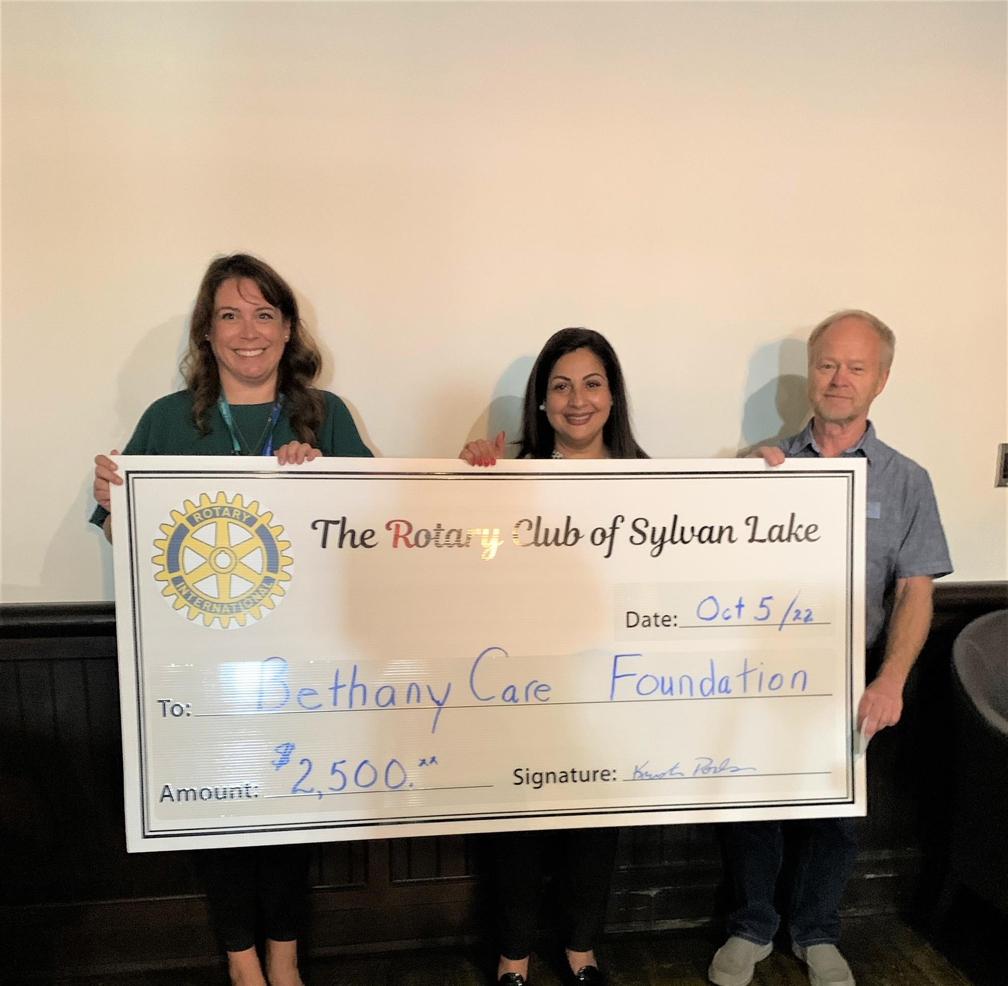 Giant Cheque Arrives Just In Time | Rotary Club of Sylvan Lake