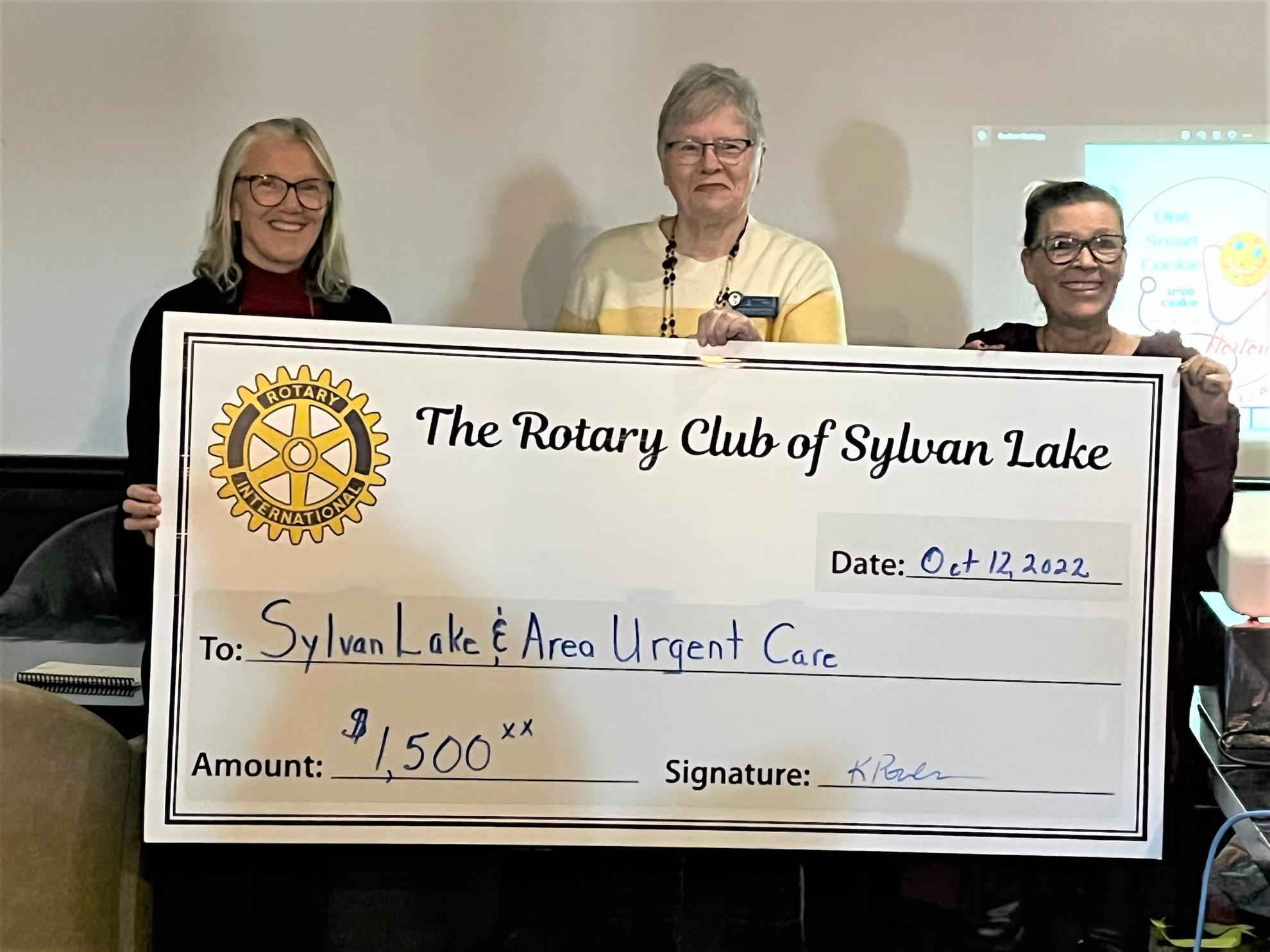 Giant Cheque Arrives Just In Time | Rotary Club of Sylvan Lake