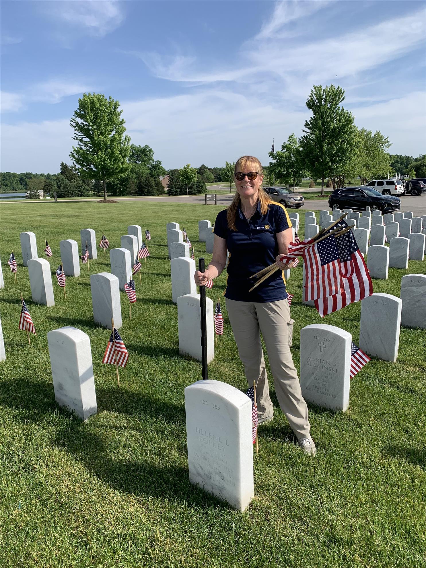 Placing flags at Great Lakes National Cemetery | Rotary Club of ...