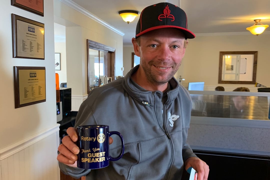 Jesse Daly shows off his Guest Speaker mug! | Mequon-Thiensville ...