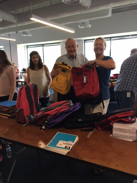 Helping At Risk Kids by Stuffing Backpacks for Cap City Kids | Rotary ...