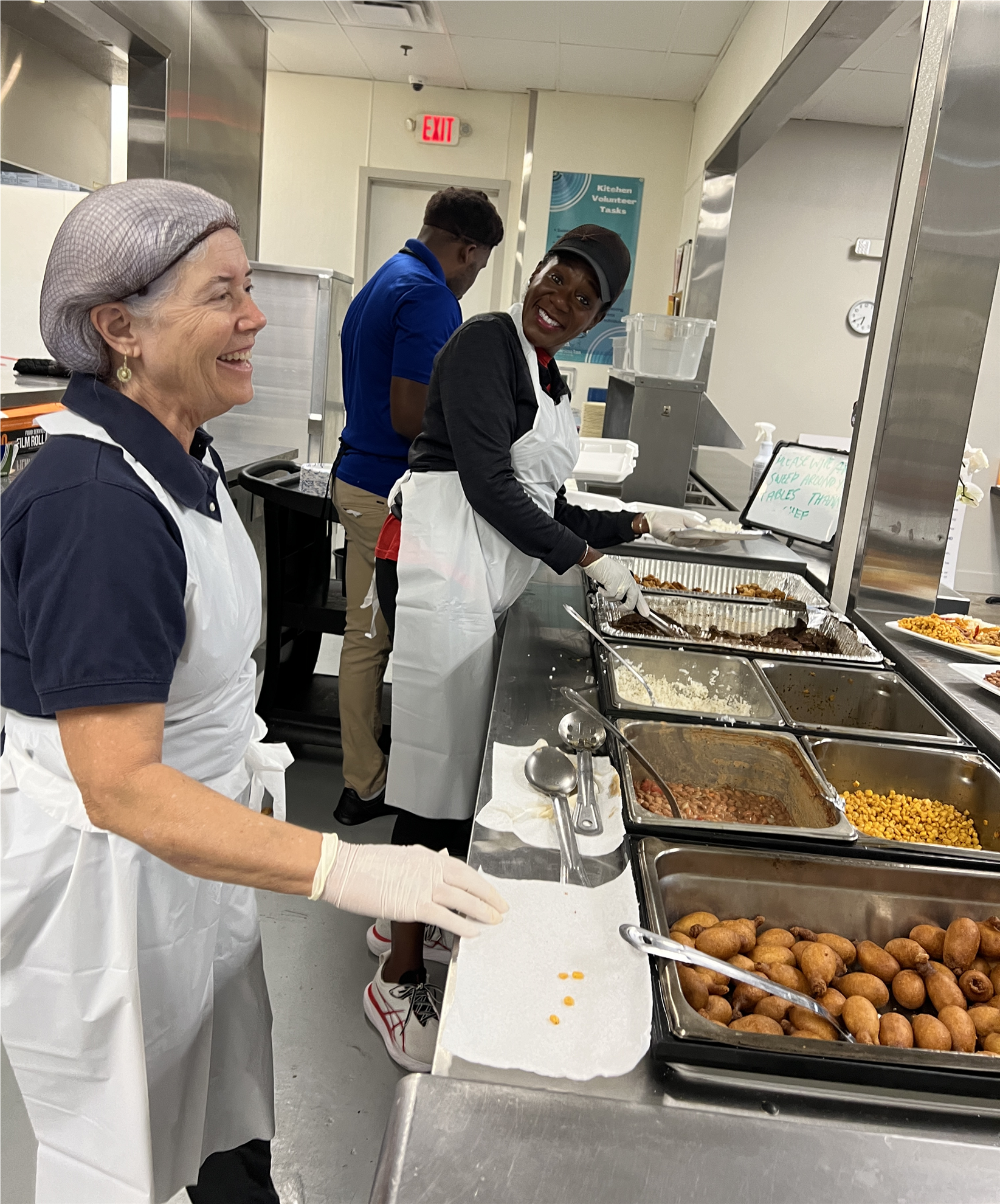 Plano Metro Serves Dinner at Samaritan Inn | Rotary District 5810