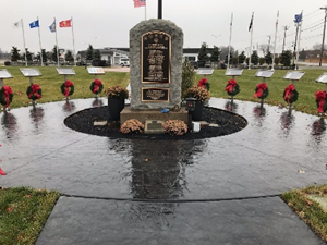 Grand Island Places Wreaths at DeGlopper Memorial | Rotary District 7090